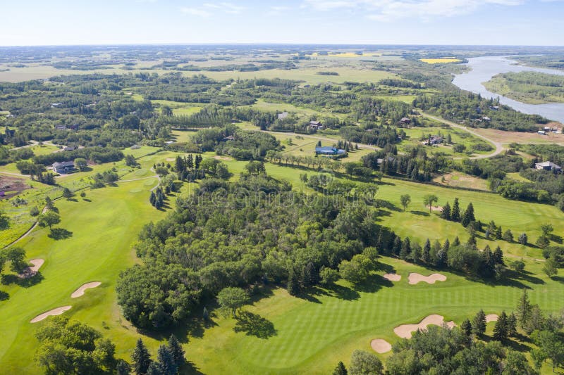 Golf Course with a Lake in the Background Stock Image - Image of ...