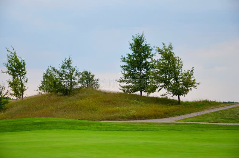 Golf Course Landscape. Golf Course Green Grass, Trees and Blue Sky ...