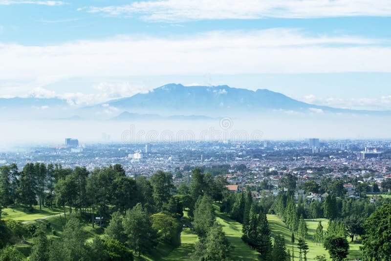 Golf Course With Misty Bandung Cityscape Background Stock Photo - Image ...