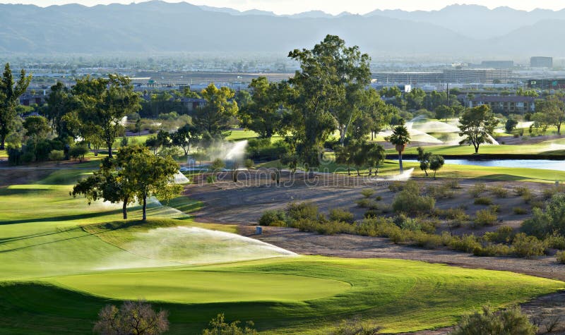 Golf Course with Mountains in Background Stock Photo - Image of ...