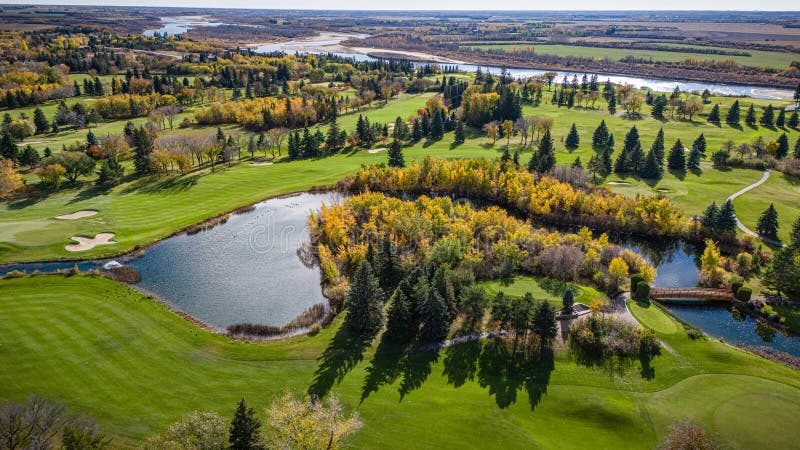 A Golf Course with a Pond in the Middle Stock Image - Image of autumn ...