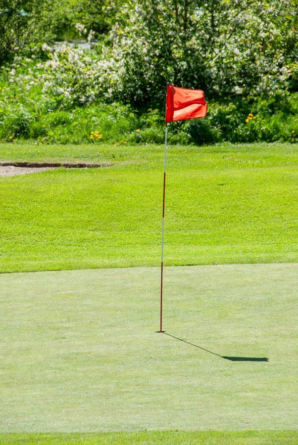 Golf Course with a Red Flag Stock Image - Image of grassland, beautiful ...