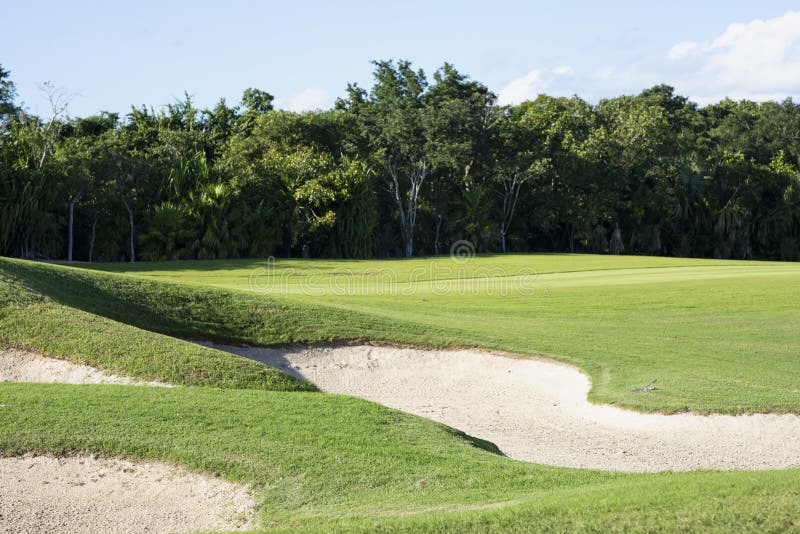 A golf course sand pit stock photo. Image of ground - 237613782