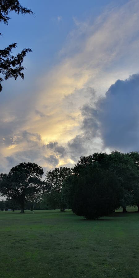 Golf course at sunset stock photo. Image of golf, sunset - 157889804