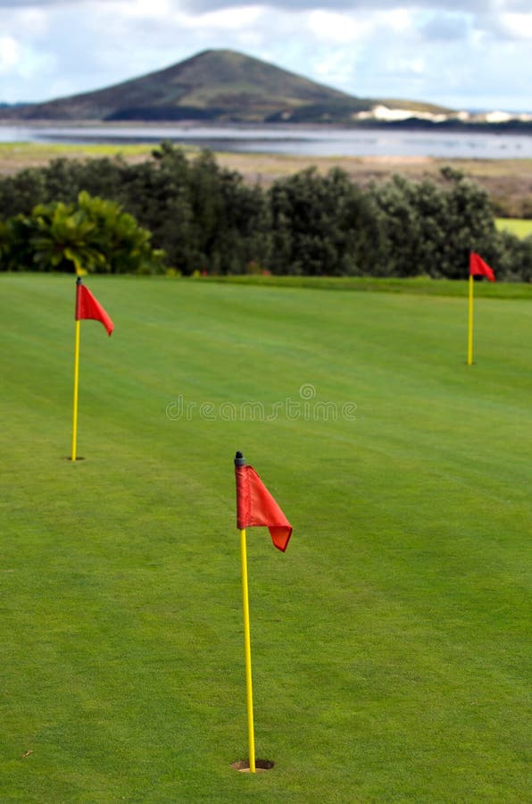 Three Red Flags at the Golf Course Stock Image - Image of green ...