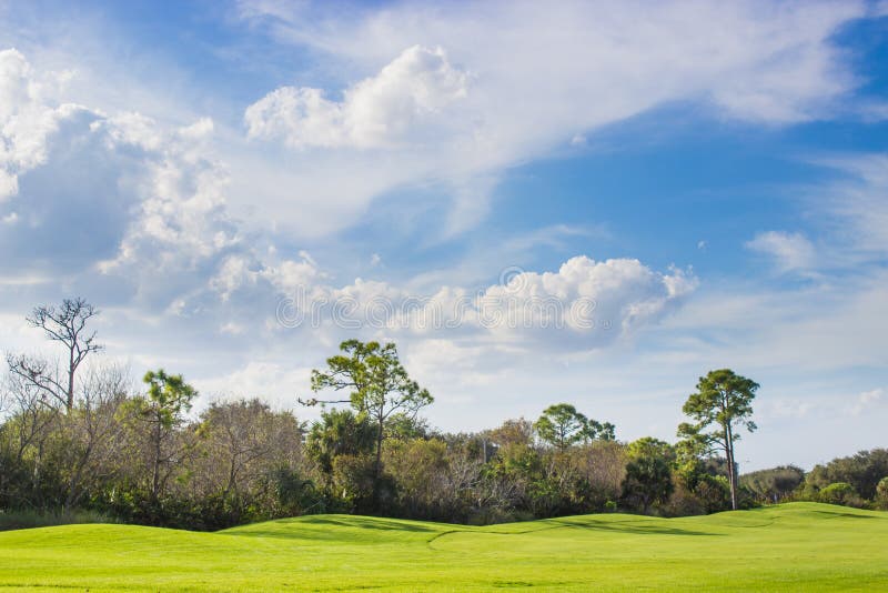 Golf Course Under Beautiful Sky Stock Photo - Image of trees, clouds ...