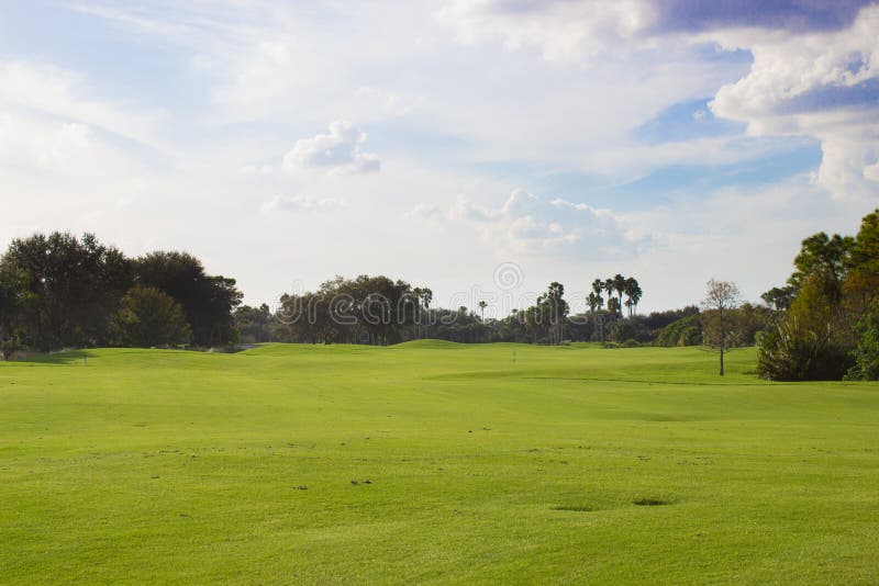 Golf Course Under Beautiful Sky Stock Image - Image of trees, blue ...