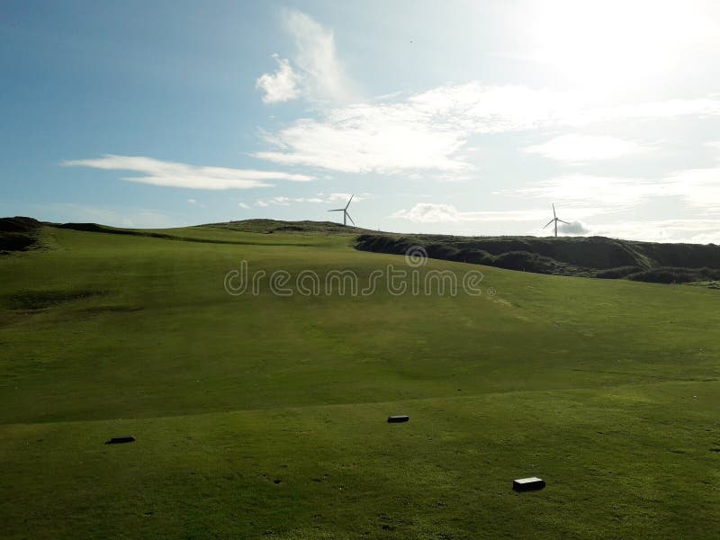 Golf Course and Wind Turbines in Front Stock Photo - Image of motion ...