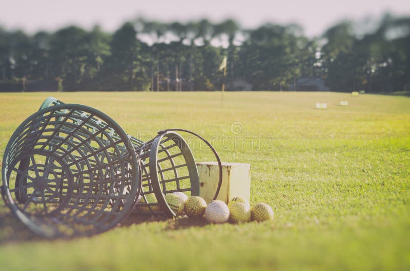 Golf at the Driving Range Basket with Golf Balls at the Rough Zone of ...
