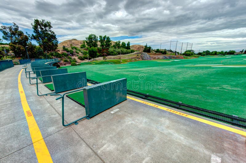 Golf Driving Range Stations Above Ground Stock Photo - Image of grass ...