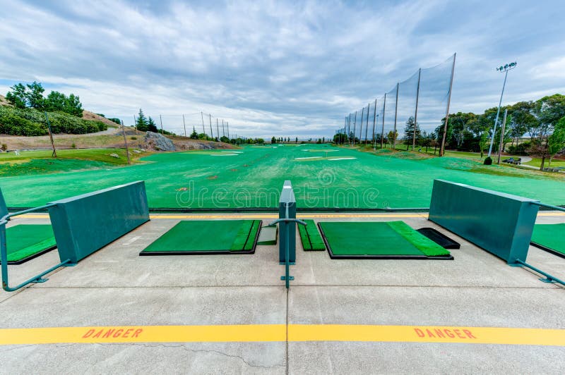 Golf Driving Range Stations Above Ground Stock Photo - Image of grass ...