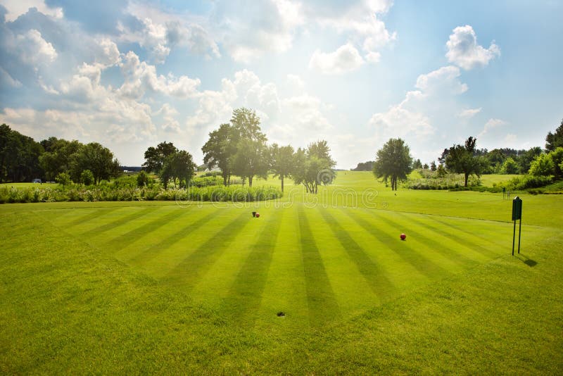 Green Golf Field and Blue Cloudy Sky Stock Photo - Image of tree ...