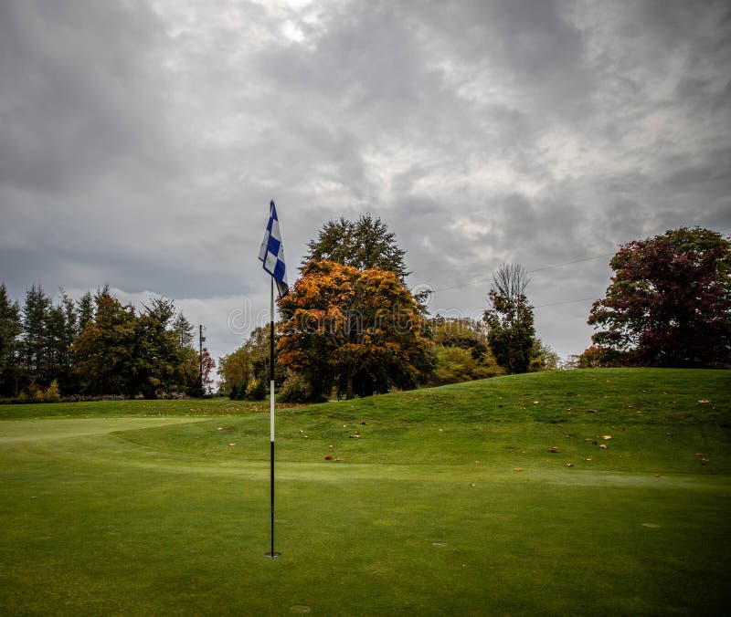 Golf Flag on a Green in the Fall Stock Photo - Image of island, leisure ...