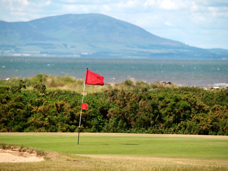 Golf Flag on the Green at a Seaside Course Stock Image - Image of green ...