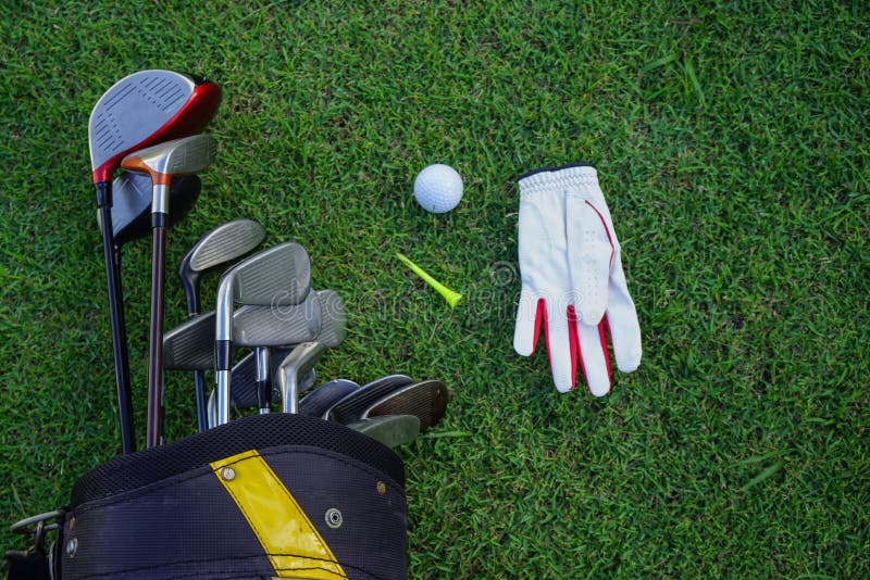 Golf Glove , White Golf Ball and Tee Put on Green Grass of Golf Course ...