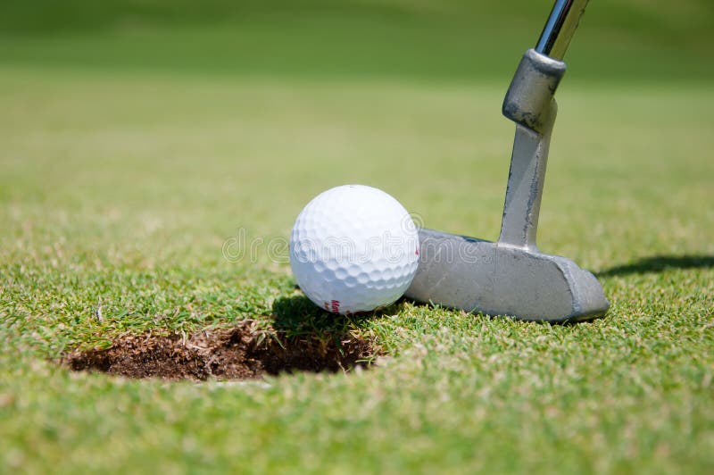 Golf ball and hole stock photo. Image of playing, country - 2117922
