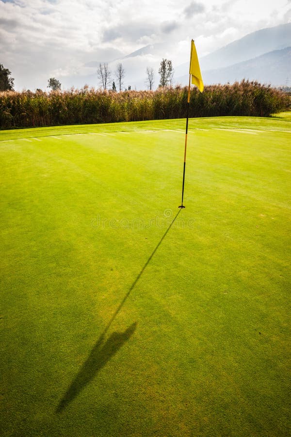 Golf hole at dawn stock image. Image of green, game, golf - 57753105