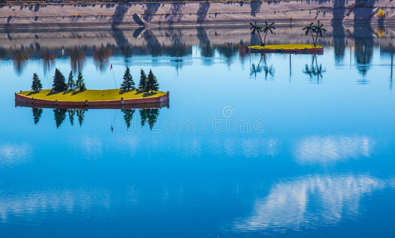 Golf Islands at Lake Driving Range Stock Image - Image of blue ...