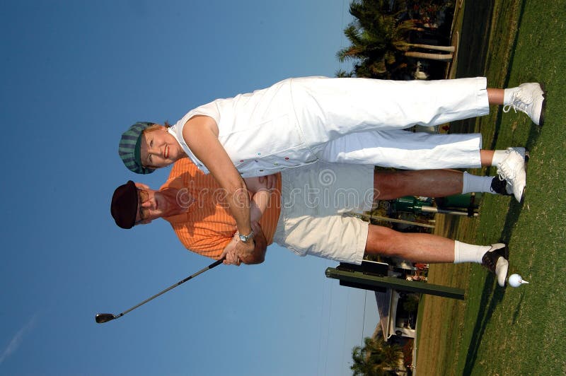 Golf lesson stock image. Image of exercise, driver, couple - 1677817