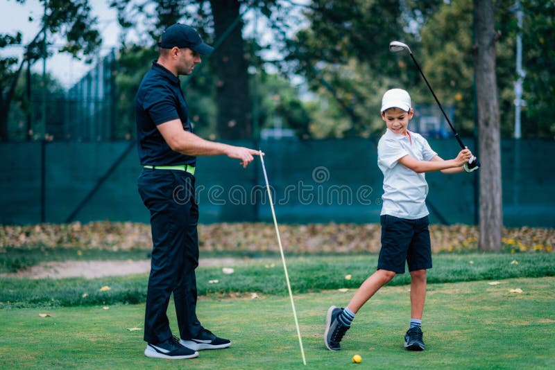 Golf â€“ Personal Training. Golf Instructor Teaching Young Boy How To ...