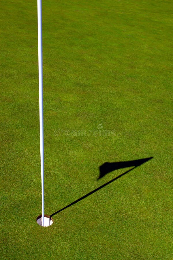 Golf Pin and Shadow stock image. Image of lush, flag - 27685549