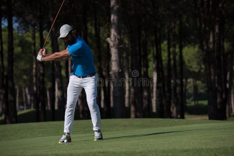 Golf player hitting shot stock image. Image of driver - 70171325