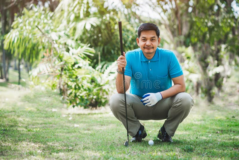 Golf Player Looking and Sitting on Field for Playing Golf on Course Tee ...