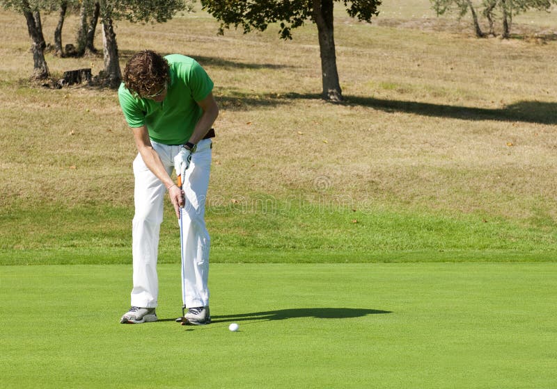 Golf Put stock photo. Image of concentration, green, recreation - 21621632