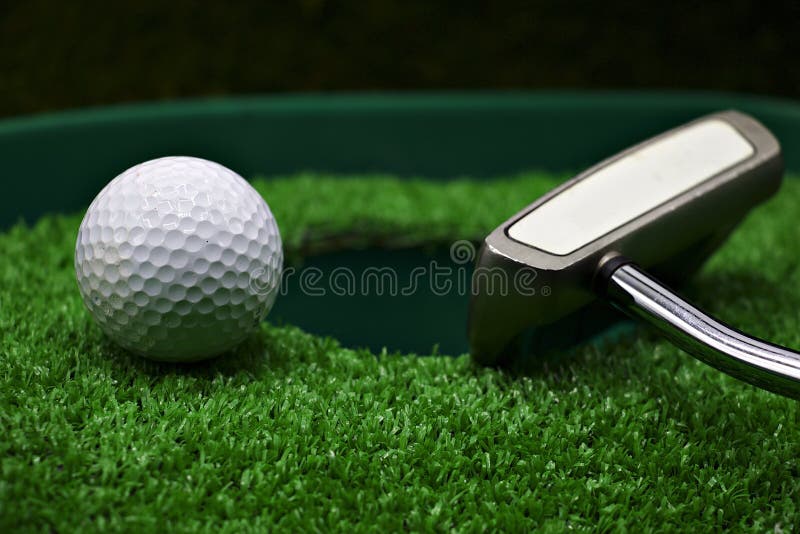 Golf and with Putter on Green Background Stock Image - Image of ...