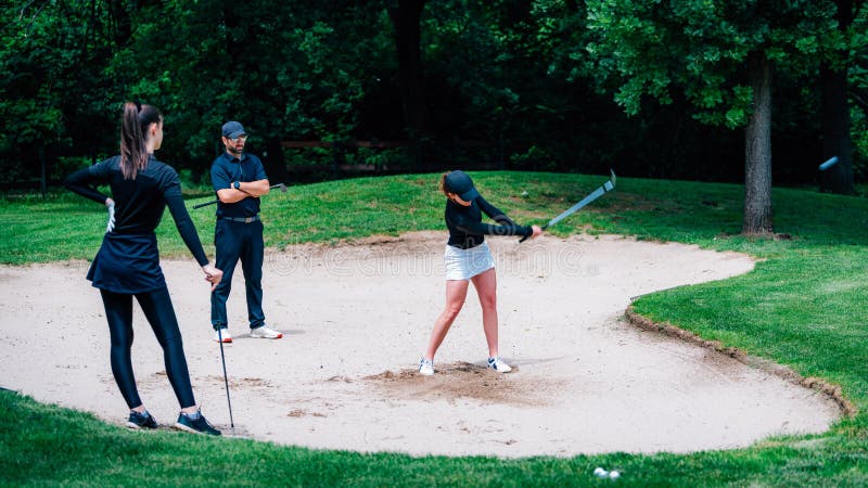 Golf Sand Practice Shots. Young Woman Having a Lesson with Golf ...
