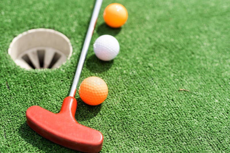 Golf Stick and Ball on Green Grass Close Up. Stock Image - Image of ...
