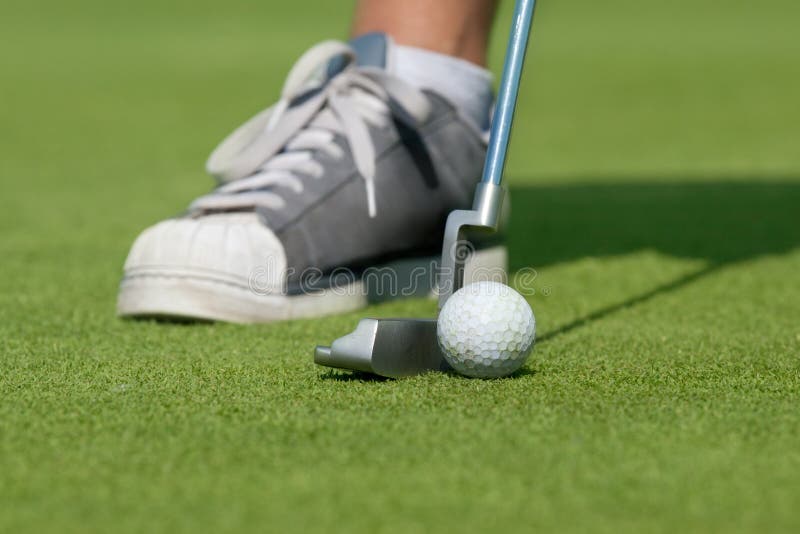 Golfer with a Putter on the Field. Stock Photo - Image of recreation ...