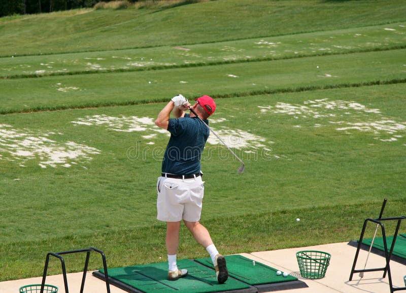 Golfer at Driving Range stock image. Image of club, sport - 1261127
