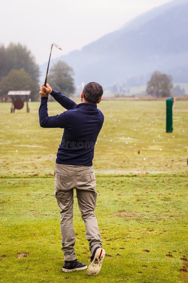 Golfer at driving range stock photo. Image of recreation - 54276690
