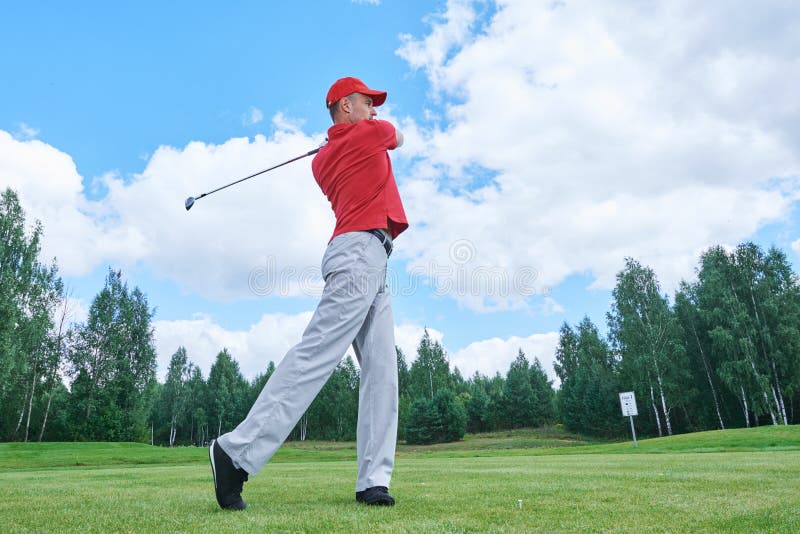 Golfer in Golf Field with Club Stock Photo - Image of outdoors ...