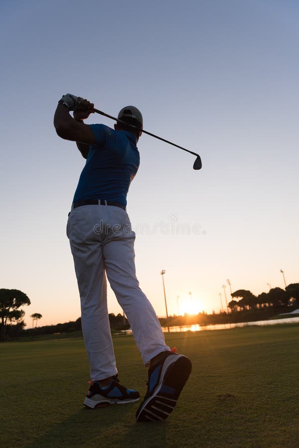 Golfer hitting long shot stock photo. Image of lifestyle - 71635002