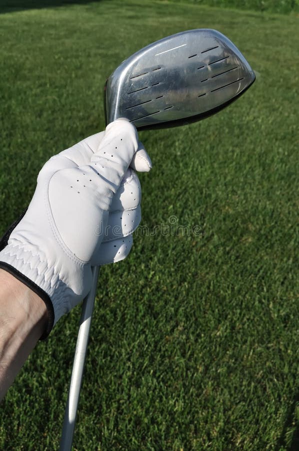 Golfer Holding a Metal Driver Stock Image - Image of grasping, clouds ...