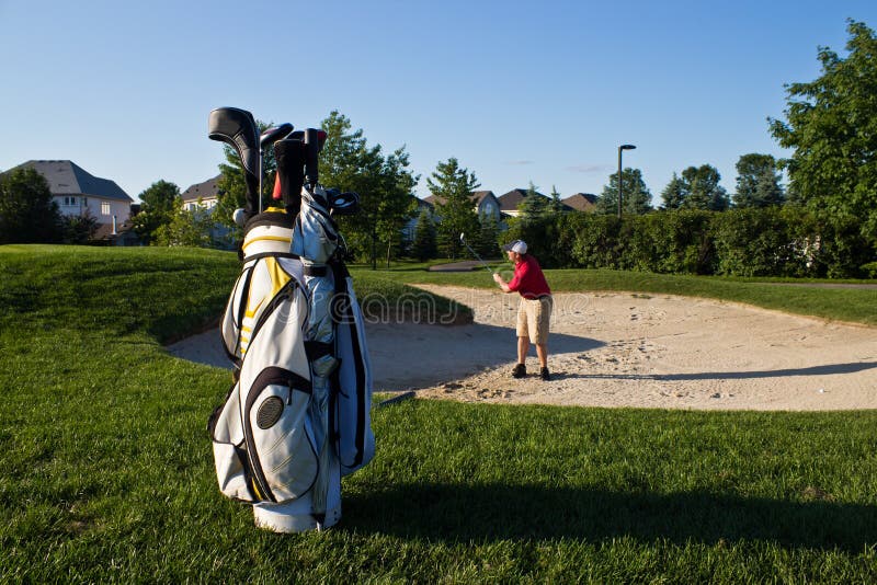 Golfer Prepares To Hit the Golf Ball from the Sand Trap Stock Image ...