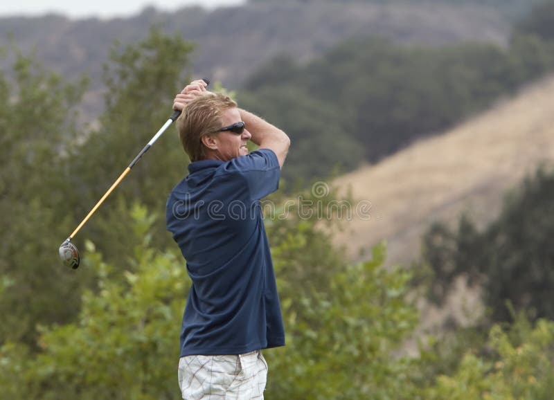 Golfer at Swing Finish stock photo. Image of golf, blue - 10370616