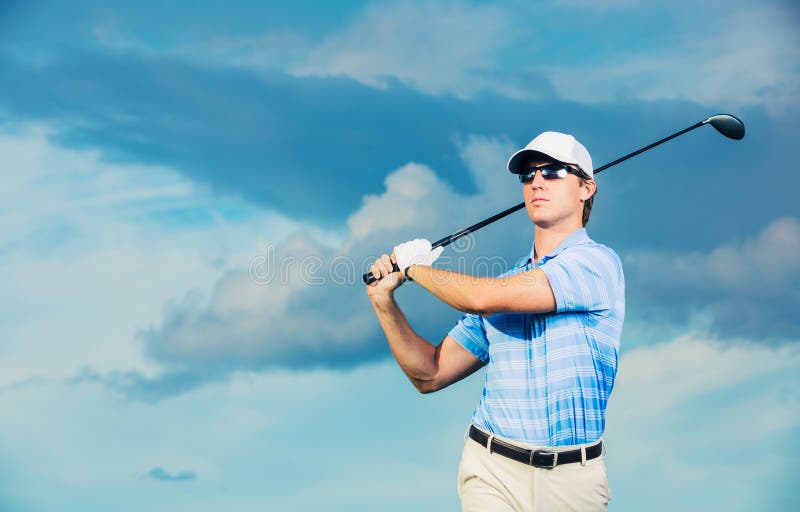 Golfer swinging golf club stock image. Image of challenge - 34957917