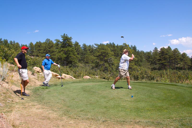 Golfer Teeing Off stock photo. Image of active, golfing - 10540758