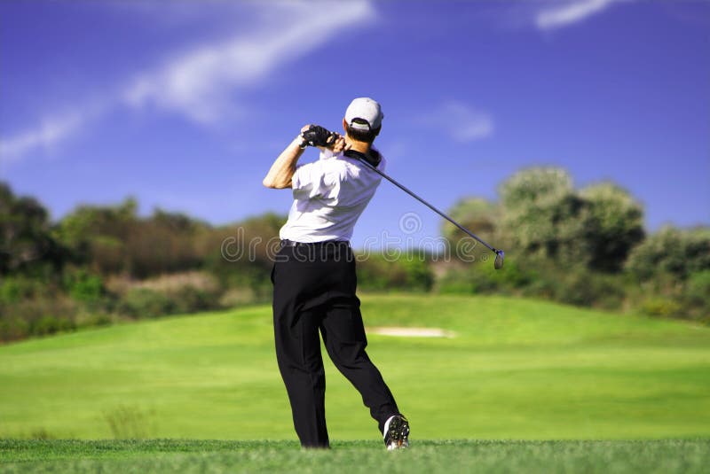 Golfer teeing off c stock image. Image of golf, golfer - 960761