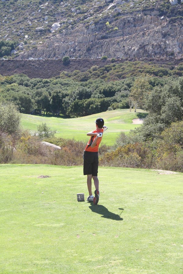 Golfer teeing off editorial stock image. Image of golfer - 48503339
