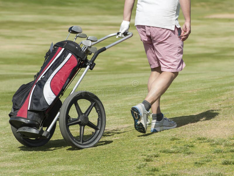 Golfer Walking on Course with Bag Stock Photo - Image of strolling ...