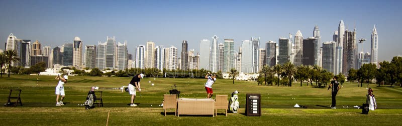Golfers Practice on Driving Range with Dubai Skyline in the Background ...