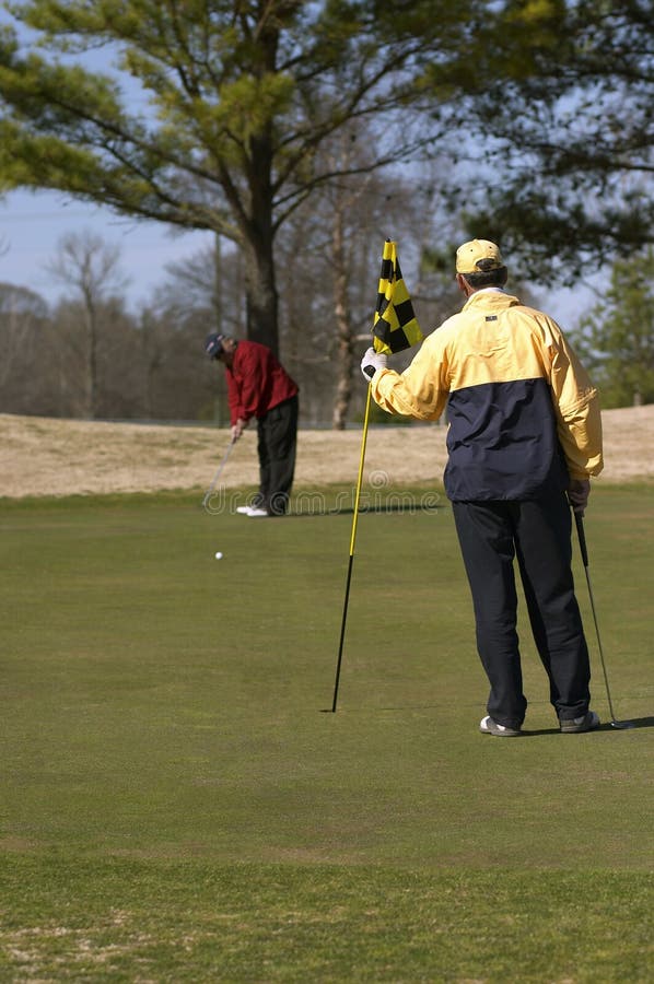 Golfers putting stock image. Image of team, sports, flag - 603683