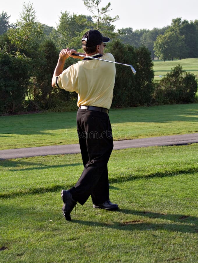 Golfers #61 stock photo. Image of male, shoes, pitch, stroke - 960768