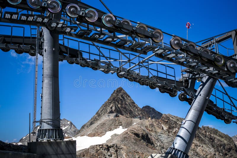 Gondola Cables and Engine with Mountain in between Stock Image - Image ...