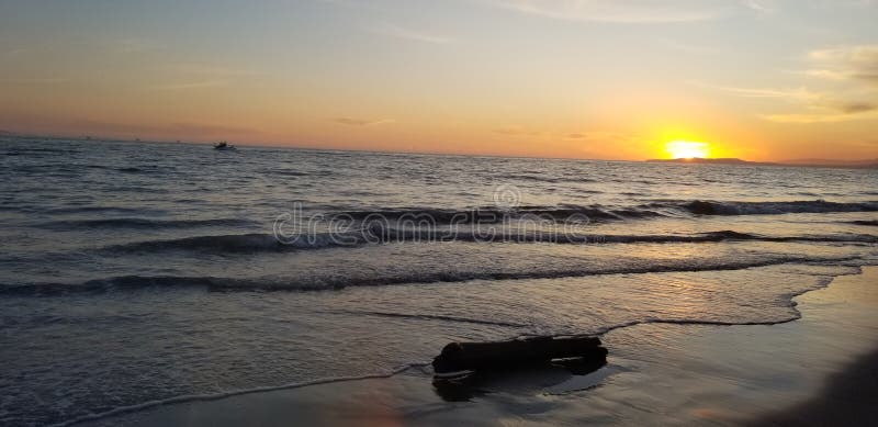 Almost gone sun stock image. Image of sunset, horizon - 163342923