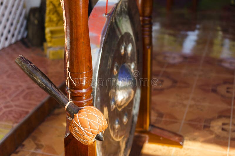 Hit the gong stock image. Image of hand, monastery, monk - 30669053